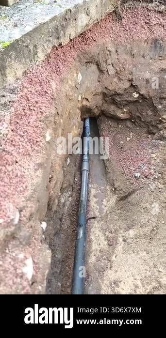 A modern trenchless utility installation method. A repair site with ...