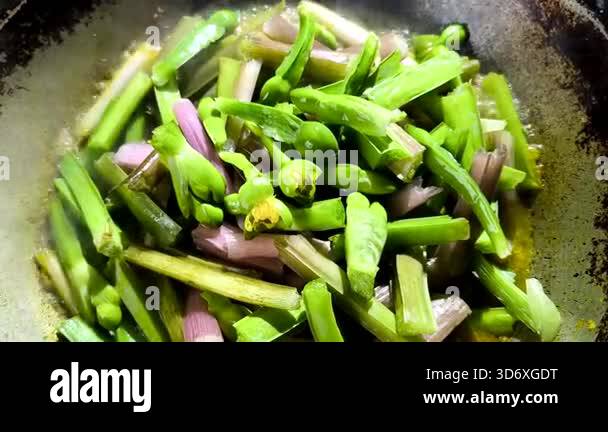 Cooking Chinese celery in pan, indoor Chiangmai Thailand Stock Video ...