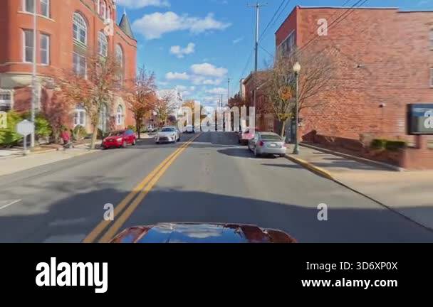 A car navigates the charming streets of Martinsburg, West Virginia ...