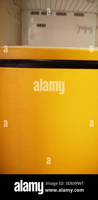 Open Small Yellow Refrigerator in a Modern Space. Open Small Yellow ...
