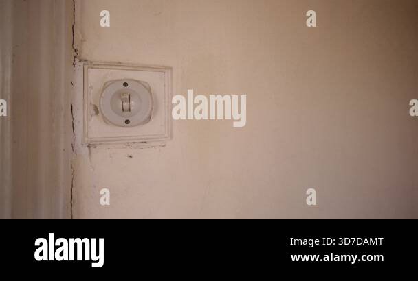 An old fashioned 1940's British house light switch made out of plastic ...