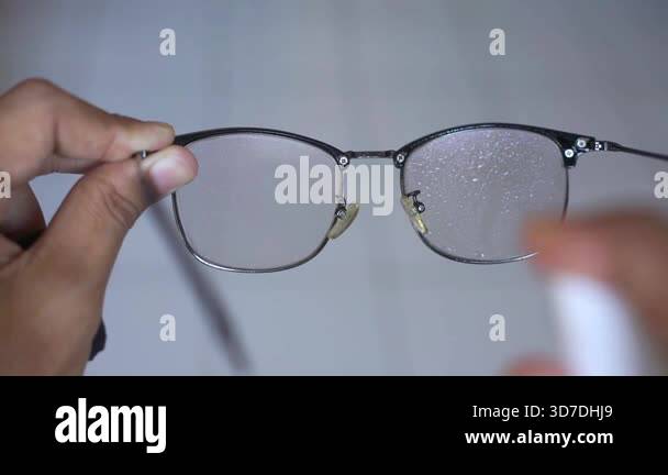 Dust, cloth and glasses in hands for cleaning lens and vision with ...