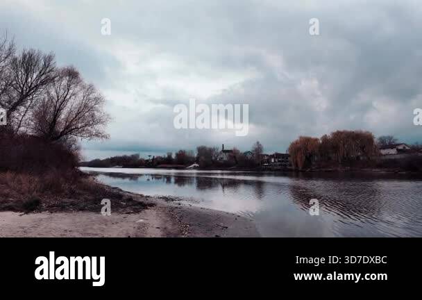Beautiful autumn landscape with a lake and blue water. Retro-style ...
