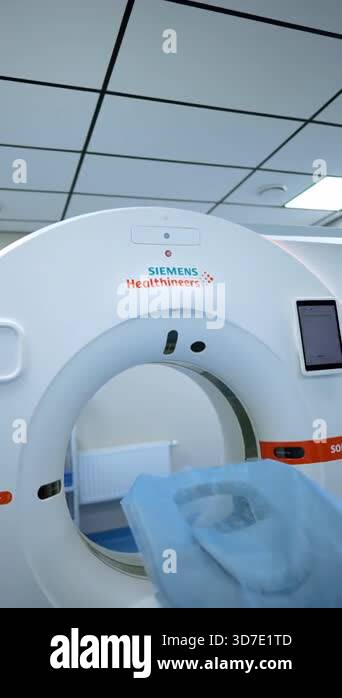 Kyiv, Ukraine, 2 August 2025: CT scanner table with a blue protective ...