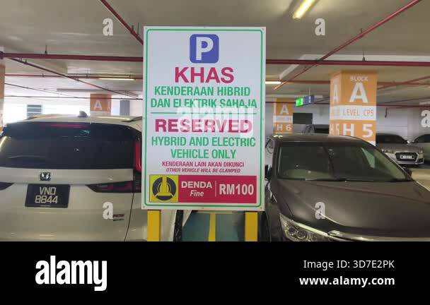 Sepang. Malaysia -March 2, 2025: A bilingual sign, in English and Malay ...