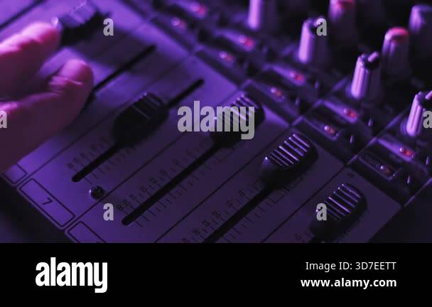 Close-up of audio mixer faders on a professional soundboard showing ...