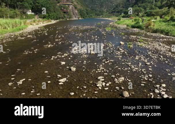 Aerial view of the river and surrounded by mountains in yangjiaxi xiapu ...
