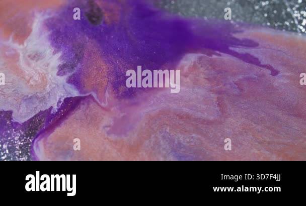 Spill splash. Shiny texture. Defocused pink purple bronze colorful ink ...