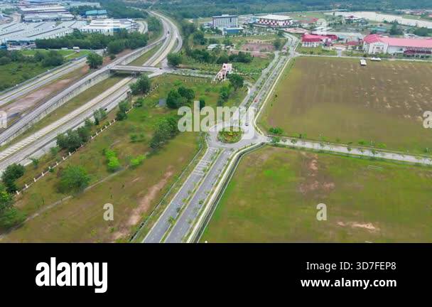 Aerial view of a landscaped entrance gateway leading into a modern ...