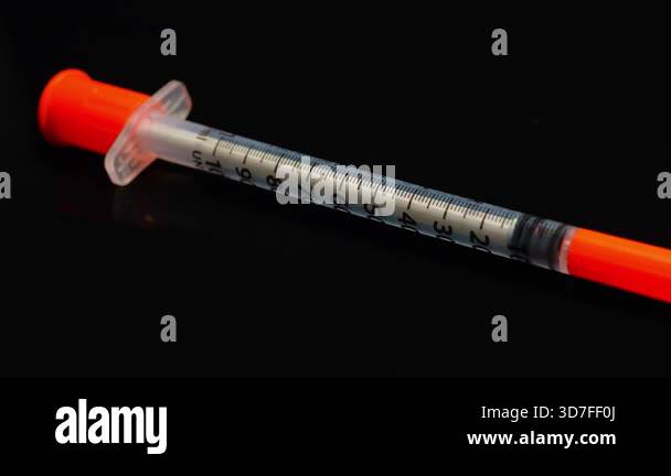 Needle and syringe used to inject drugs into veins, intravenous ...