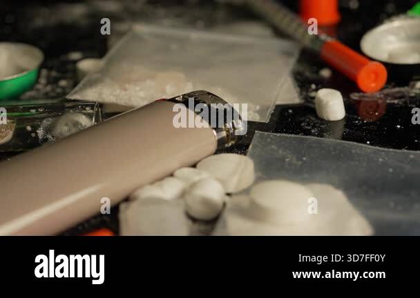 Open Harm Reduction kit supplies displays on the table. Short Injection ...