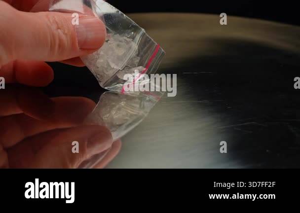 Methamphetamine drug in a plastic bag. Crystal meth or methamphetamine ...
