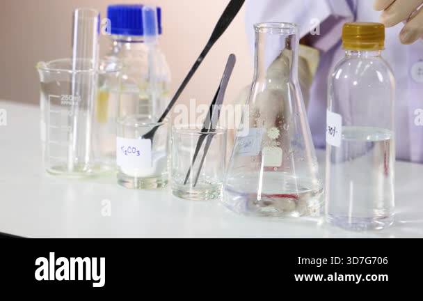 Chemical reaction demonstrating color change in solution Stock Video ...