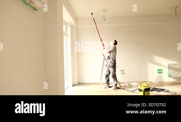 Man in uniform paints ceiling Stock Videos & Footage - HD and 4K Video ...
