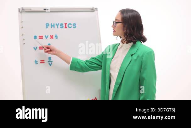 Woman explains distance formula as conducts physics lesson at school ...