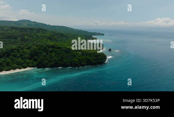 Coastline with waves and azure water. Samal Island. Davao, Philippines ...
