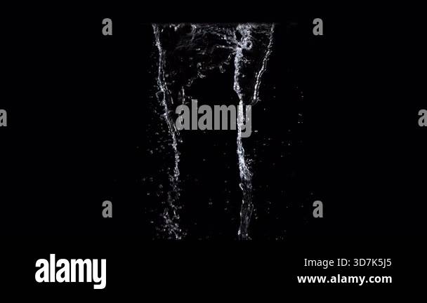 Super Slow Motion Shot of Dripping Water Isolated on Black Background ...