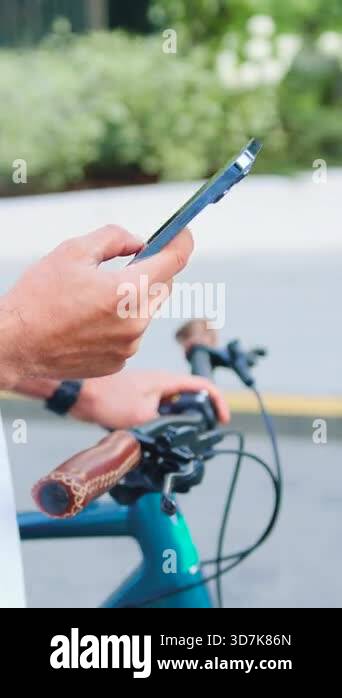 Close-up man using smartphone typing a message while being leaned on ...