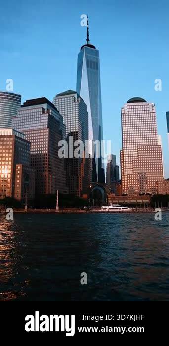 Dark waterscape of the river and modern glass high-rises. Skyline of ...