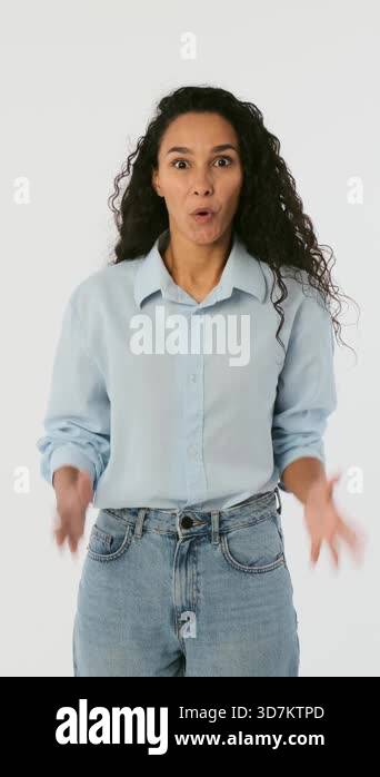 Surprised young woman showing excitement and shock. Happy female ...