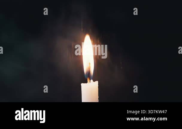 Explore the mesmerizing beauty of candle flame softly flickering ...