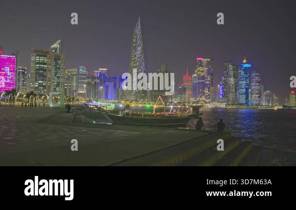 Doha, Qatar-October 21 2025: Doha skyline at night from the corniche ...