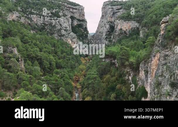 Captivating aerial perspective overlooking a steep mountain ravine ...