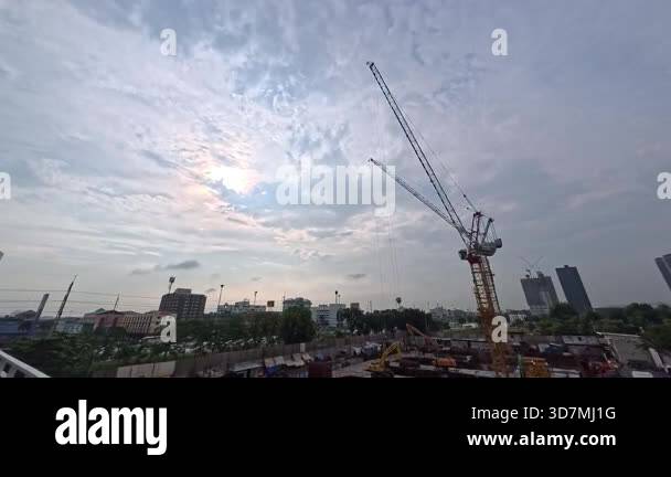 Crane tower in construction site. Industry construction . Crane tower on city background ,Pathum ...