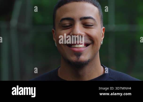 Smiling Latin Hispanic man of African descent with goatee and nose ring ...