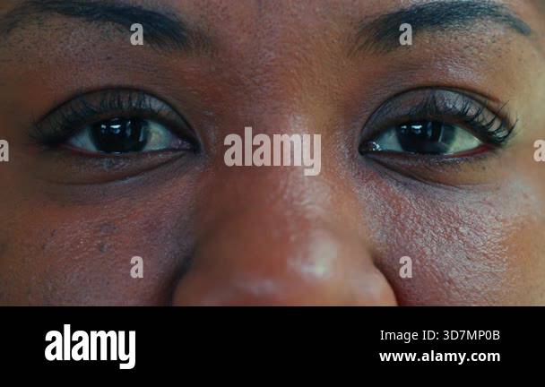 Extreme close up of African American womans eyes showing warmth and ...