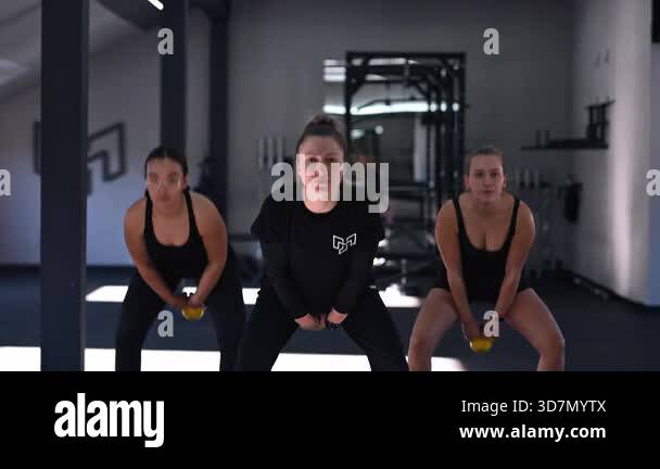 Energetic women perform exercises Stock Videos & Footage - HD and 4K ...