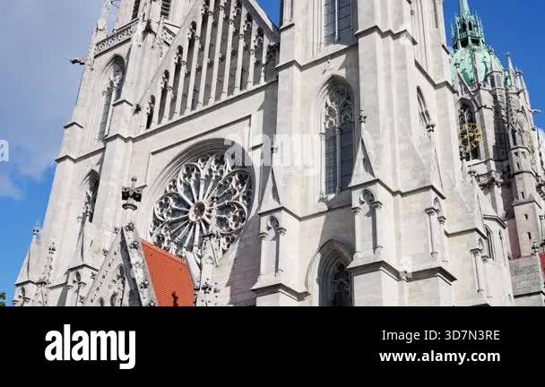 gothic cathedral facade under blue sky, close-up capturing ornate ...