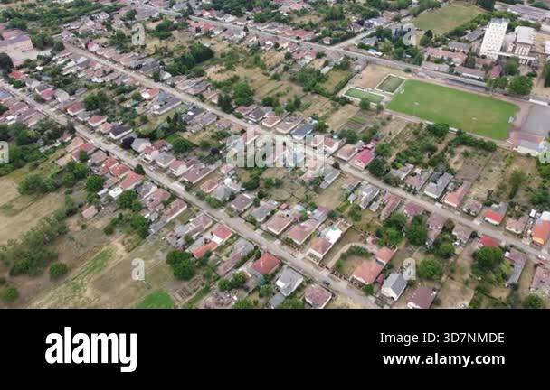 Drone footage, quiet East European neighborhood on the Balkan, detached ...