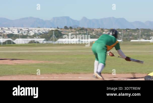 male pitcher pitching on mound batter batting runner running home ...
