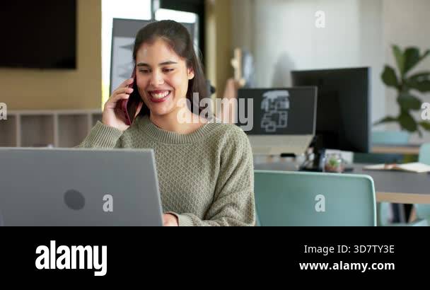 Hispanic woman receiving call on smartphone for work, smiling, laughing ...