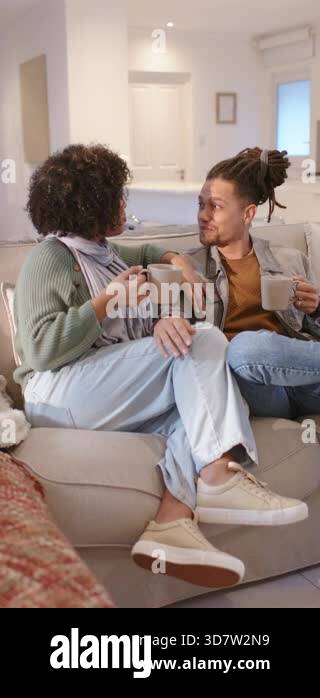 Vertical video: Gesture sparking chatting between diverse couple over ...