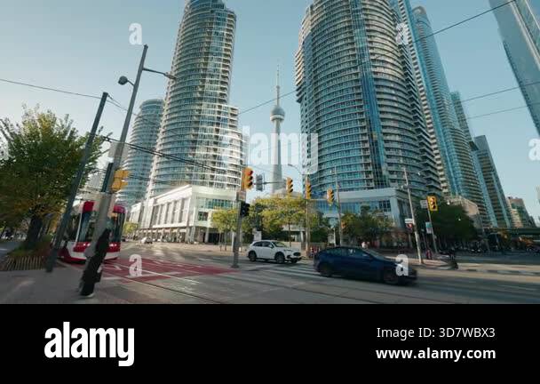 Toronto, Canada, 28 October 2025: Red Toronto streetcar approaching a ...