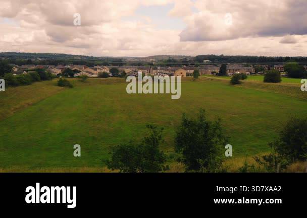 Semi rural English Suburbs and farmland aerial drone wide 4k panning ...