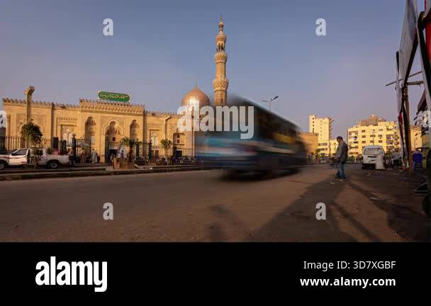 Time lapse clip of people and cars in front of El-Sayeda Zainab Mosque ...
