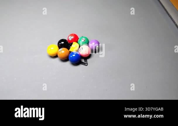 9-Ball Billiards Break Shot. A high-angle, close-up shot captures the ...