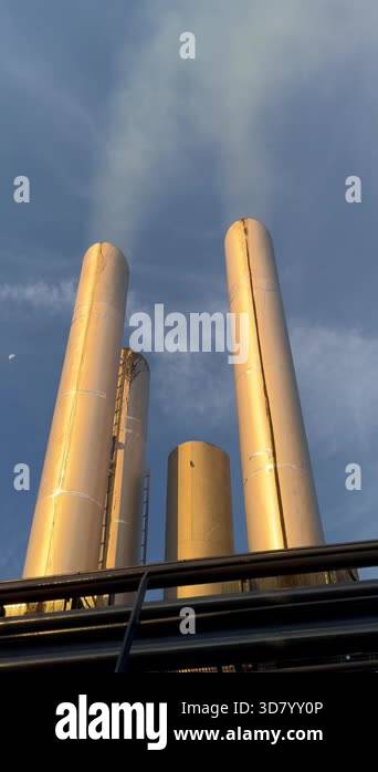Video of the tall, large metal smokestacks of a cruise ship against the ...