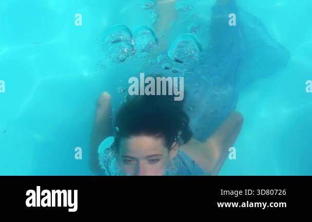 Summer recreation with girl swimming underwater. Girl snorkeling ...
