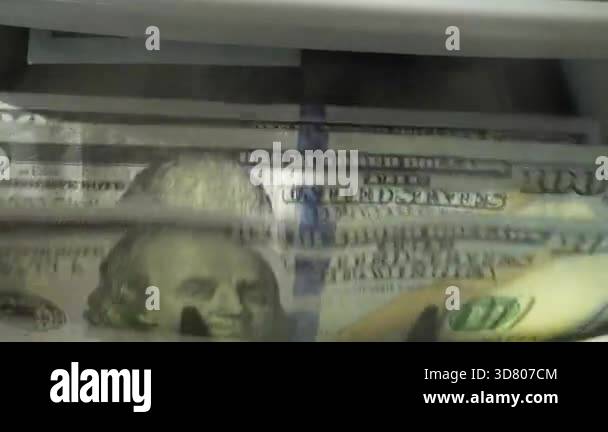 Finance and cash dollars concept. Counting dollars with electronic ...