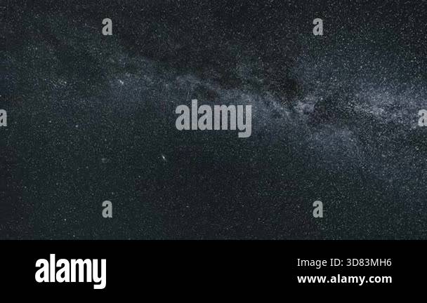 Time lapse of the Milky Way galaxy moving slowly in a dark space night ...