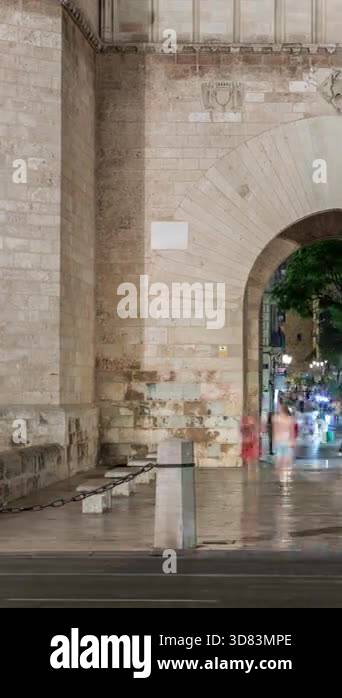 Arch entrance to Serrans Towers Torres de Serranos night timelapse in ...