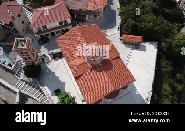 Vertical top drone shot of an old traditional Orthodox Christian stone ...