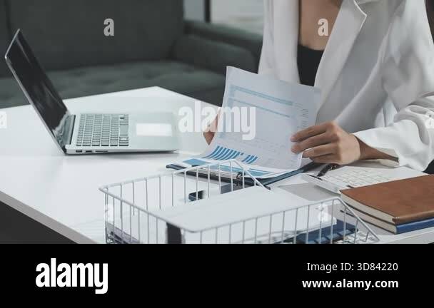 Close Up of a Businessman Working on Desktop Computer with Company's ...