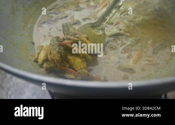 Small Snakehead or Channa orientalis fish curry. Traditional Asian fish ...