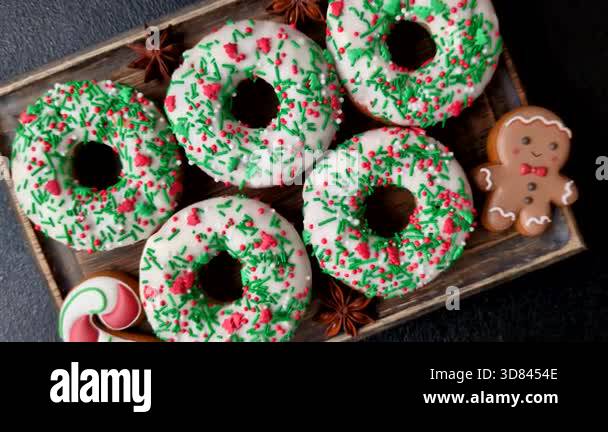 Christmas donuts or doughnuts, holiday winter sweets with sprinkles ...