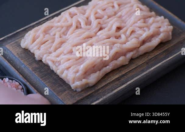 Raw ground chicken for burgers and other food. Raw minced chicken meat ...